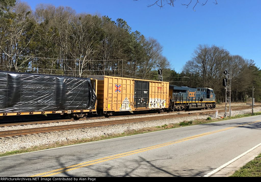 CSX 3049 gives a well-needed push at the tail end